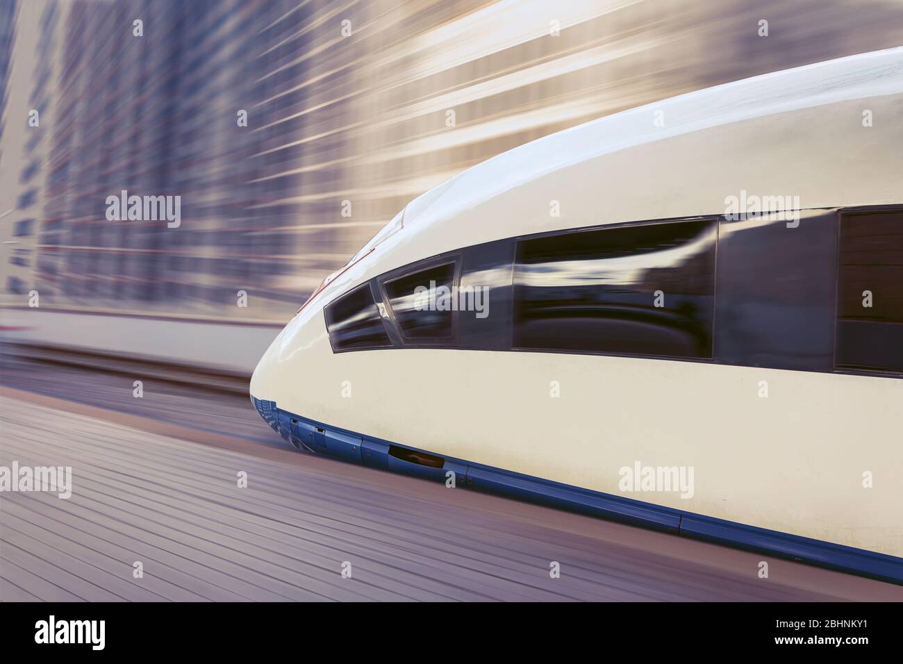 Racing high speed train in the city, blurry effect Stock Photo - Alamy