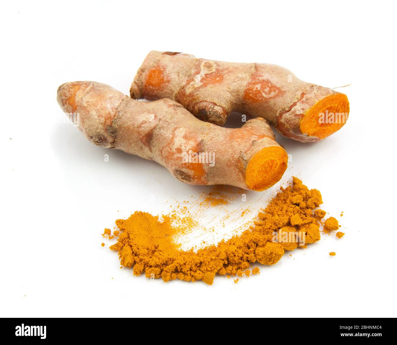 turmeric isolated on white background Stock Photo - Alamy