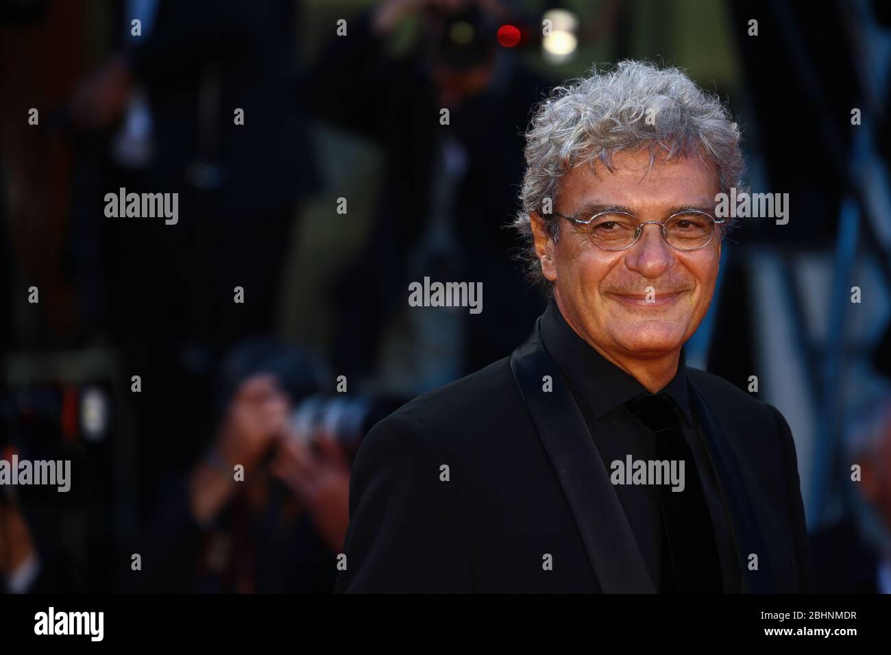 VENICE, ITALY - SEPTEMBER 06: Mario Martone walk the red carpet ahead ...