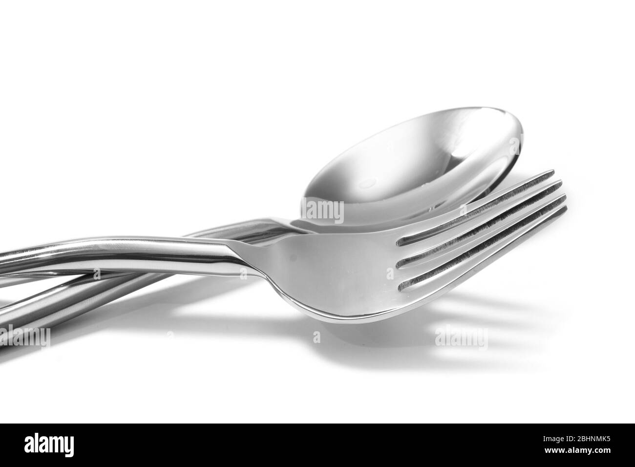 fork and spoon isolated on white Stock Photo - Alamy