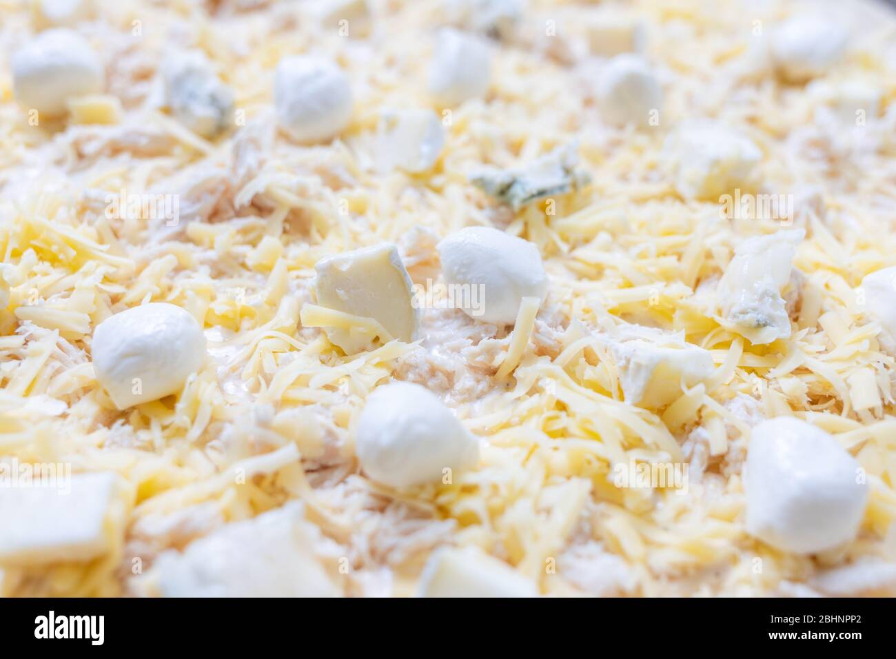Quattro formaggi cheese pizza hi-res stock photography and images - Alamy