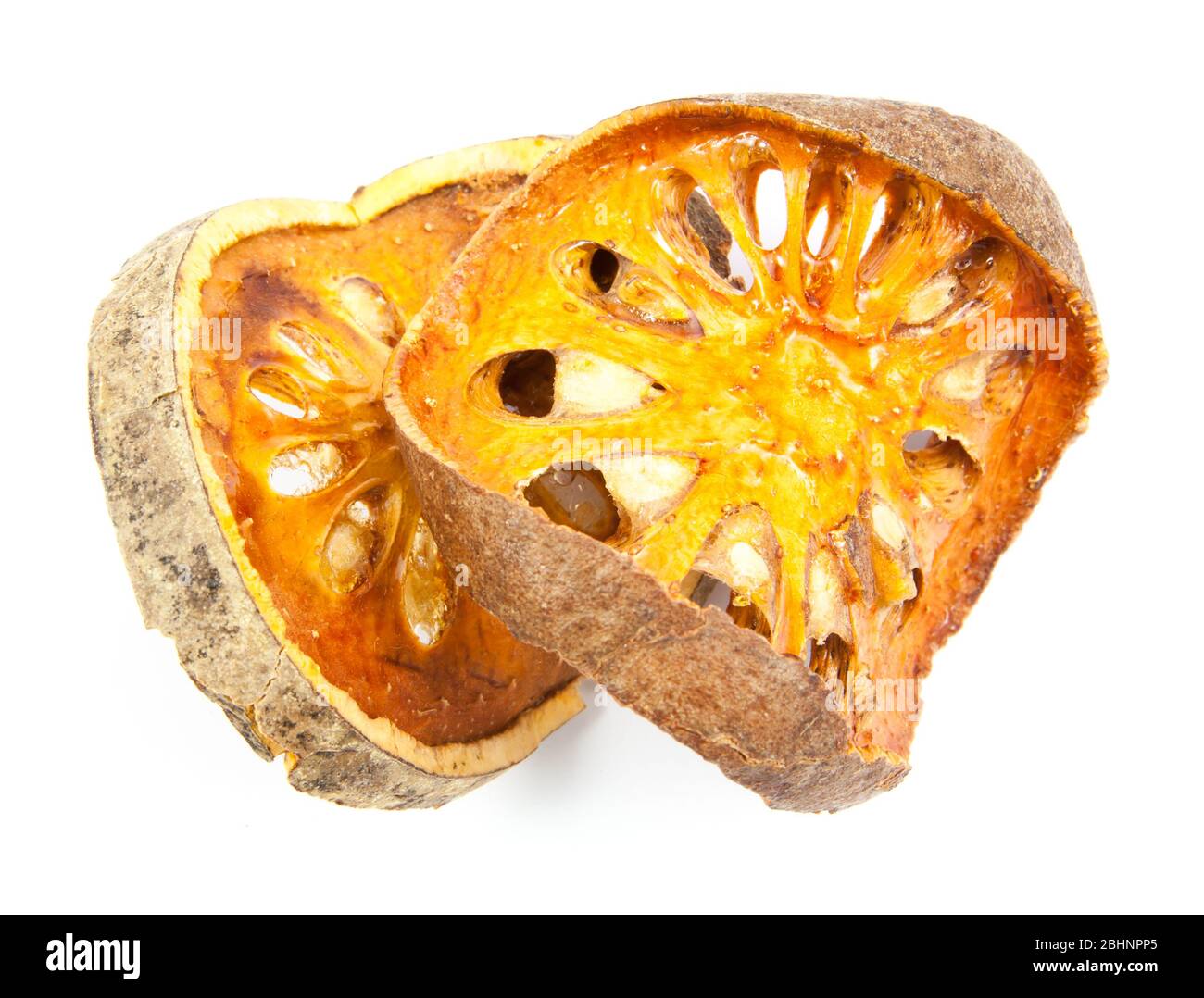 dried quince slices on a white background Stock Photo - Alamy