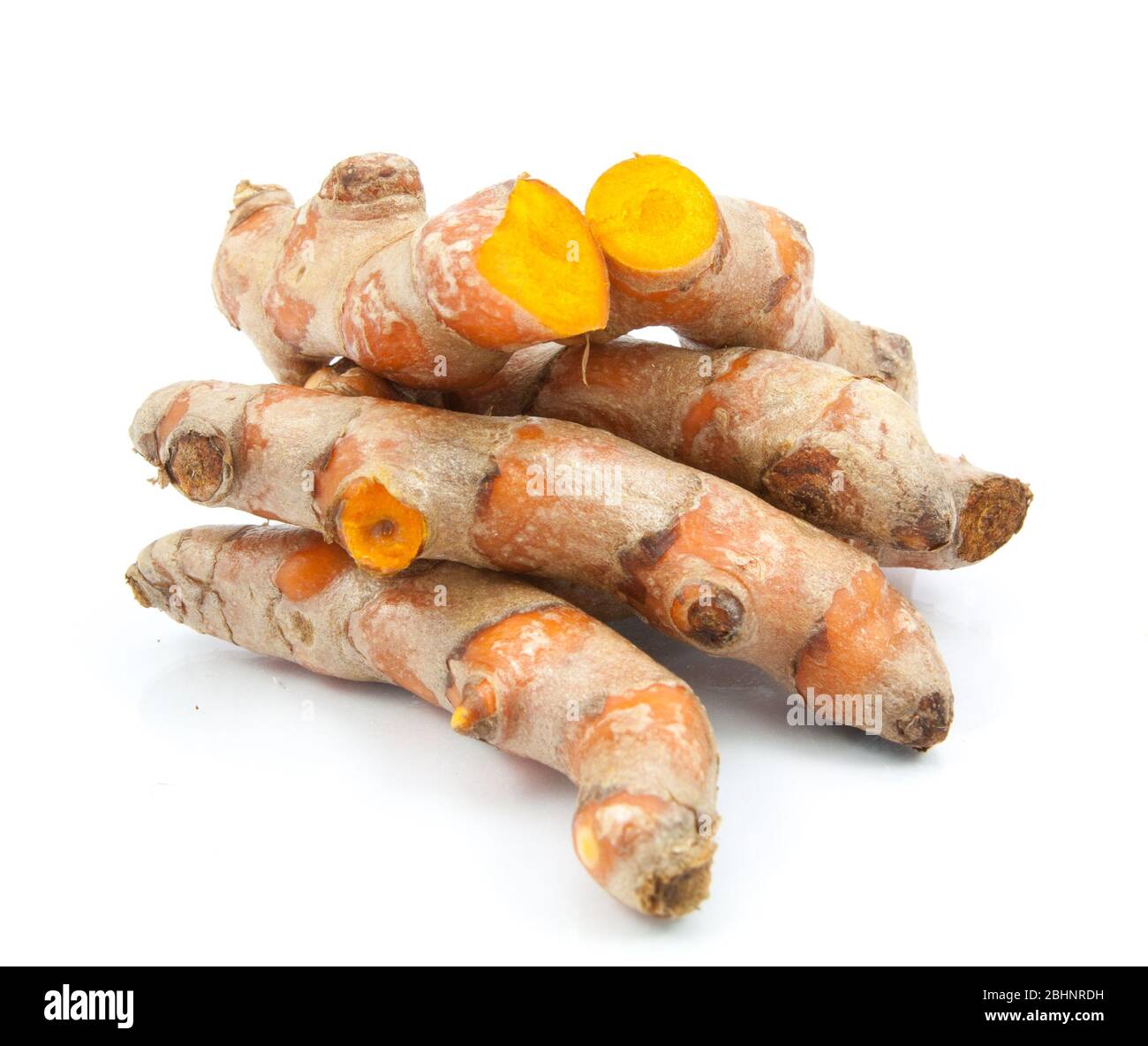 turmeric isolated on white background Stock Photo - Alamy