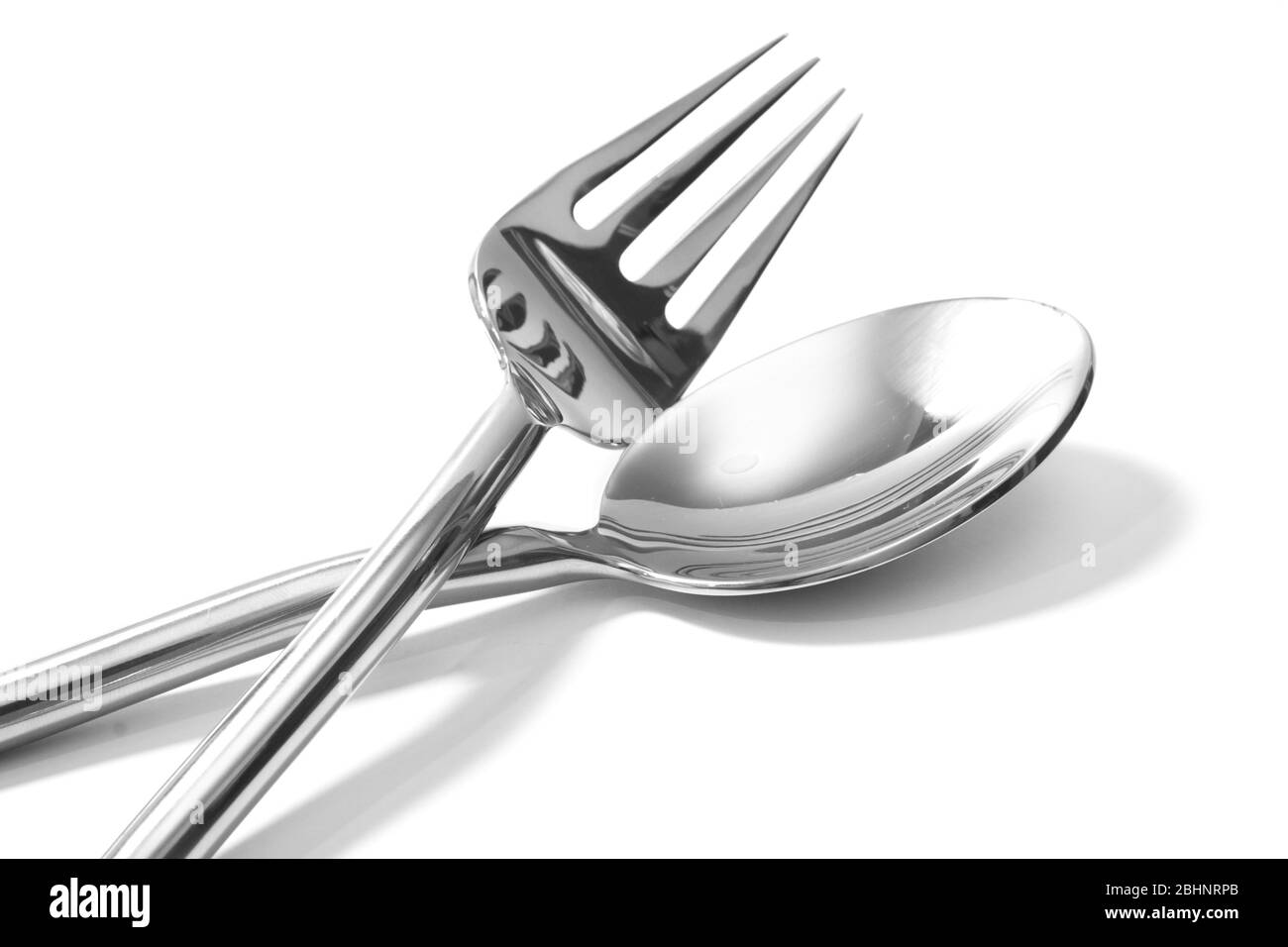 Beautiful fork and spoon on white Stock Photo - Alamy