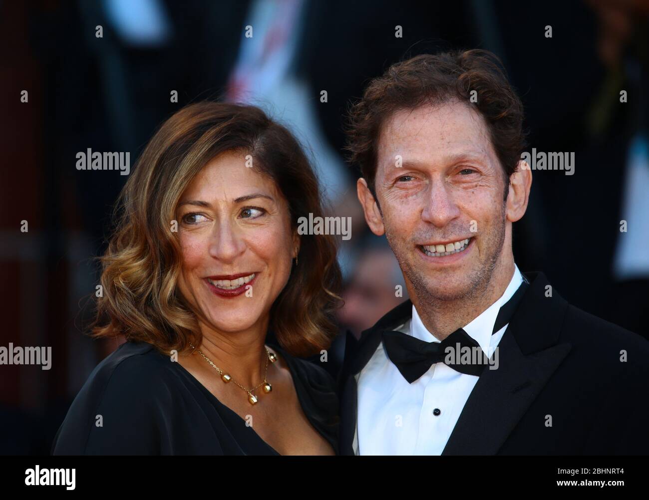 VENICE, ITALY - SEPTEMBER 08: Lisa Benavides and Tim Blake Nelson walk ...