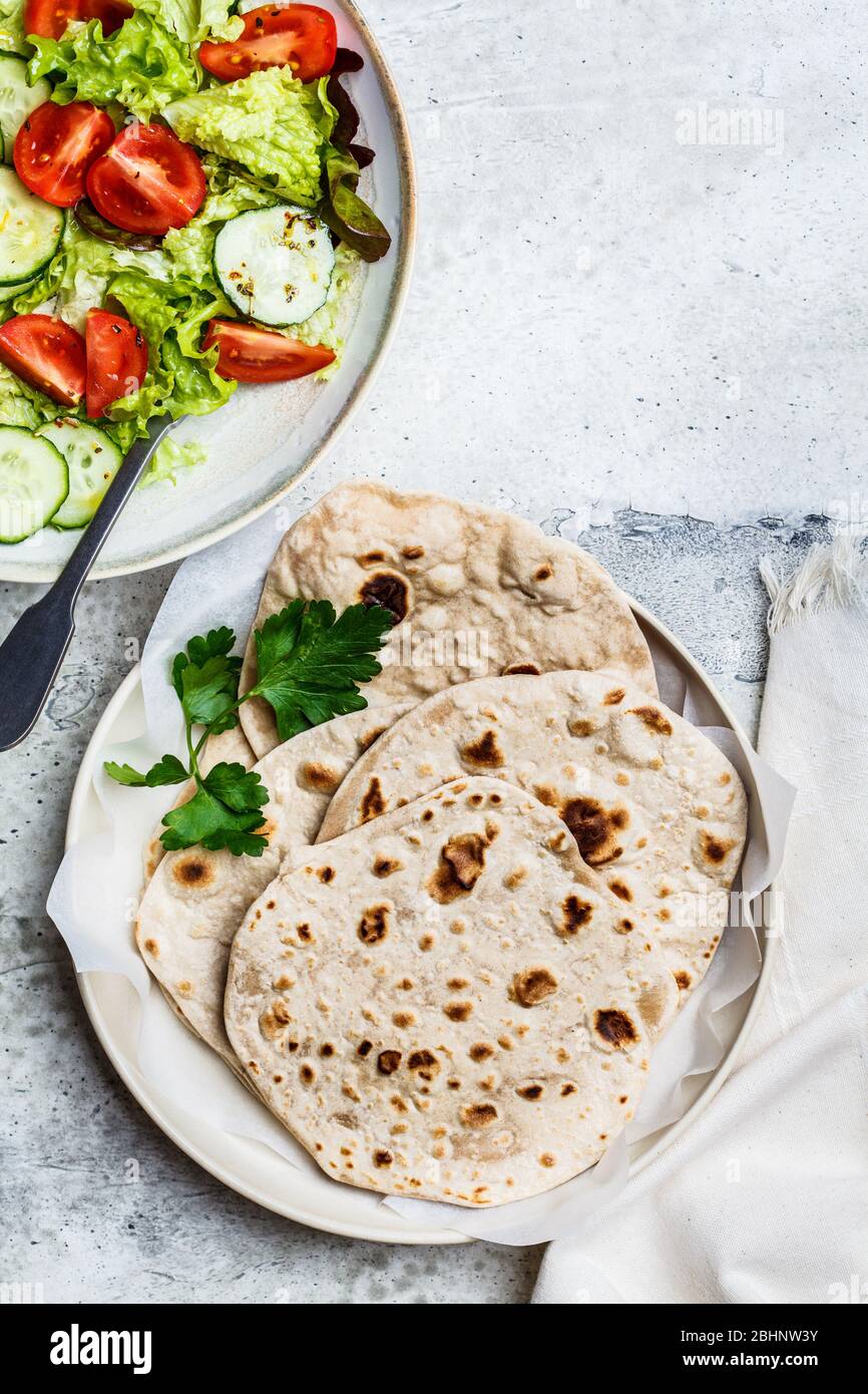 Homemade indian pita chapati on a gray background. Vegetarian cuisine ...