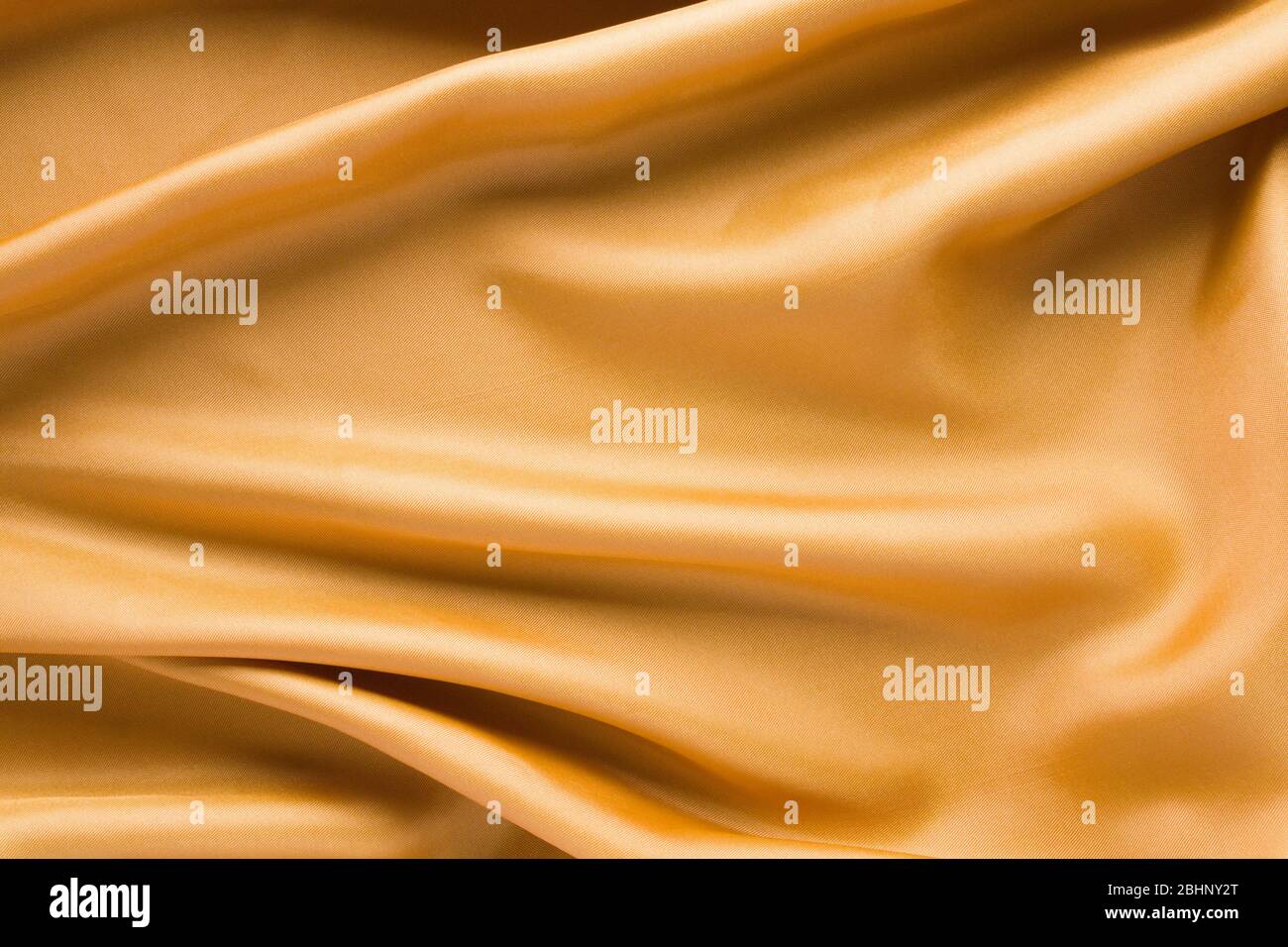 beautiful gold fabric texture background Stock Photo - Alamy