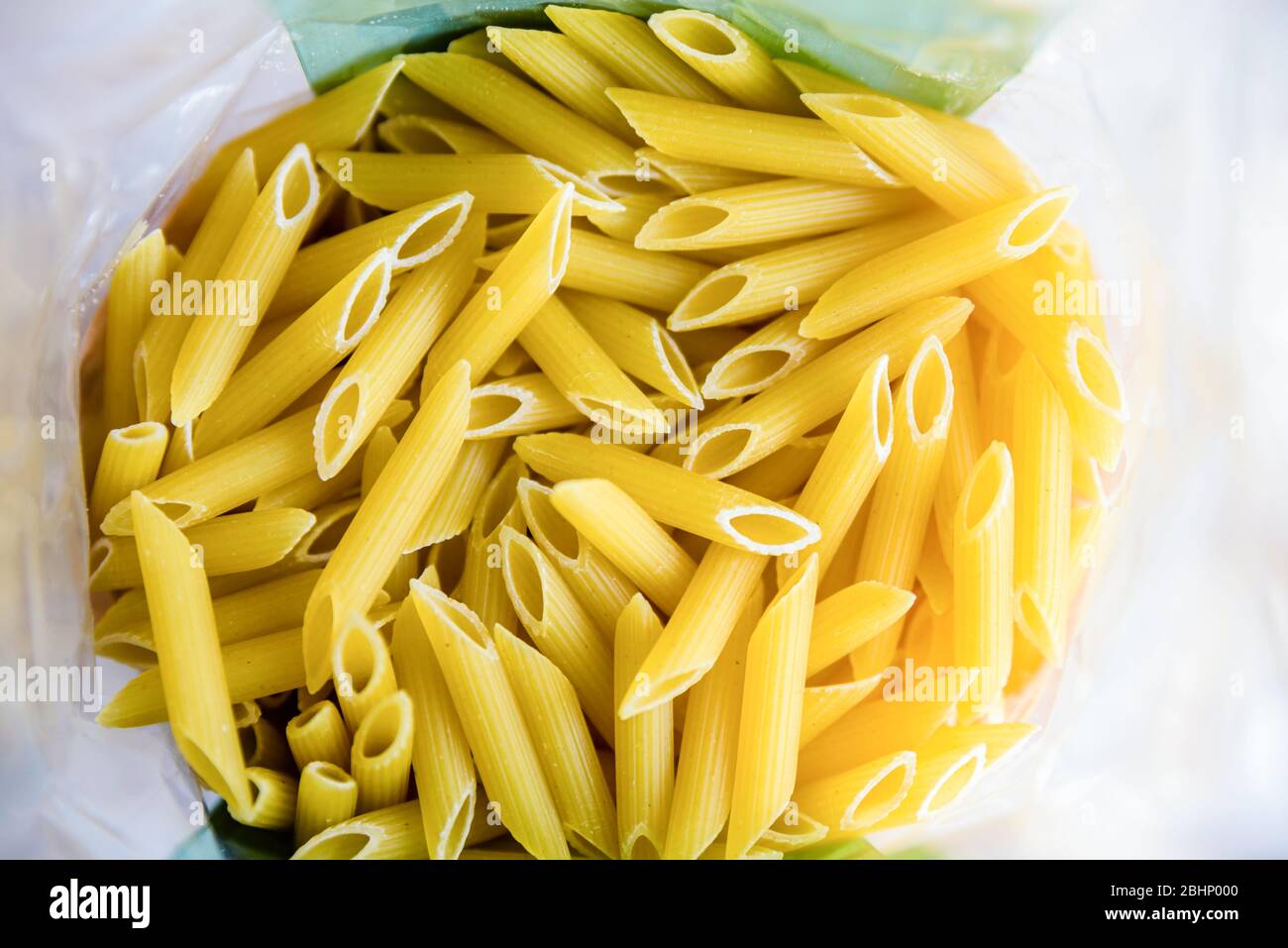 raw italian penne rigate macaroni pasta inside clear packaging Stock ...