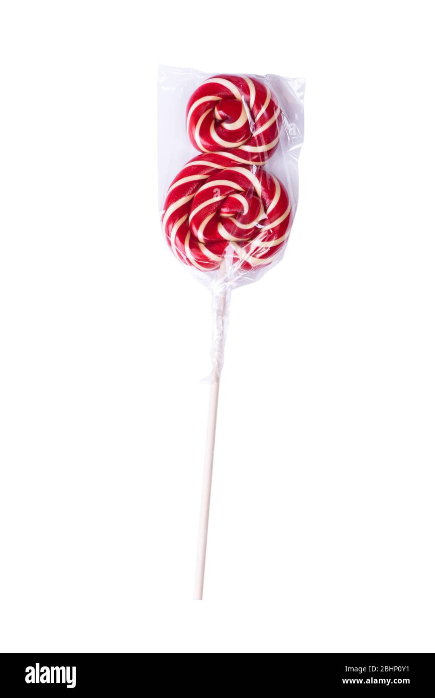 Beautiful lollipop candy stick in package isolated on white background ...