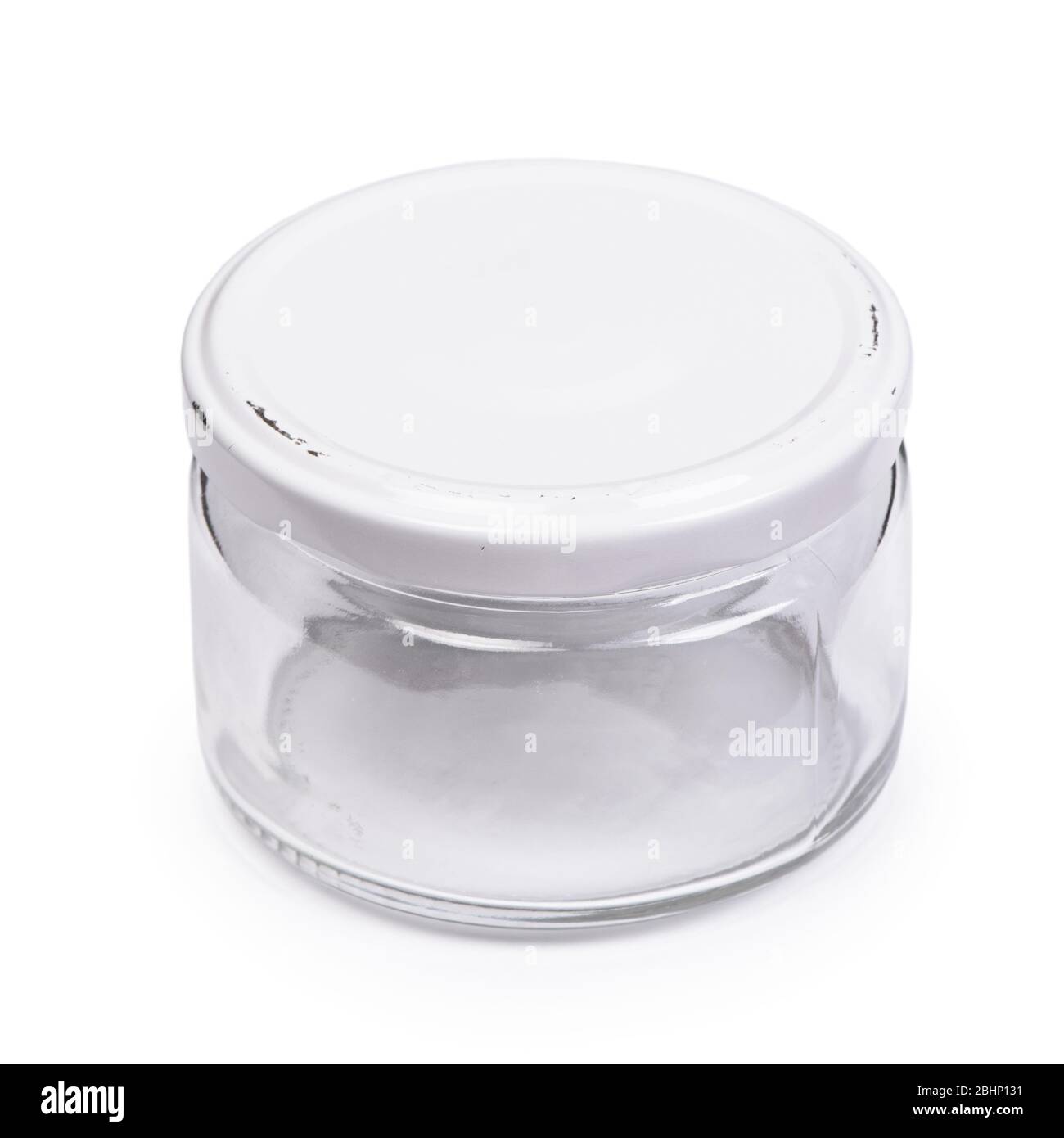 Small empty glass jar with a lid isolated on white background Stock ...