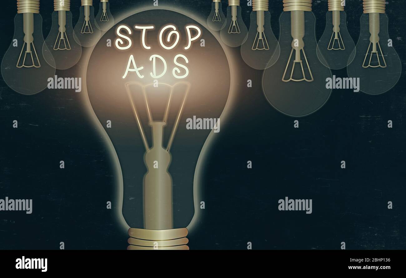 Writing note showing Stop Ads. Business concept for program that will ...