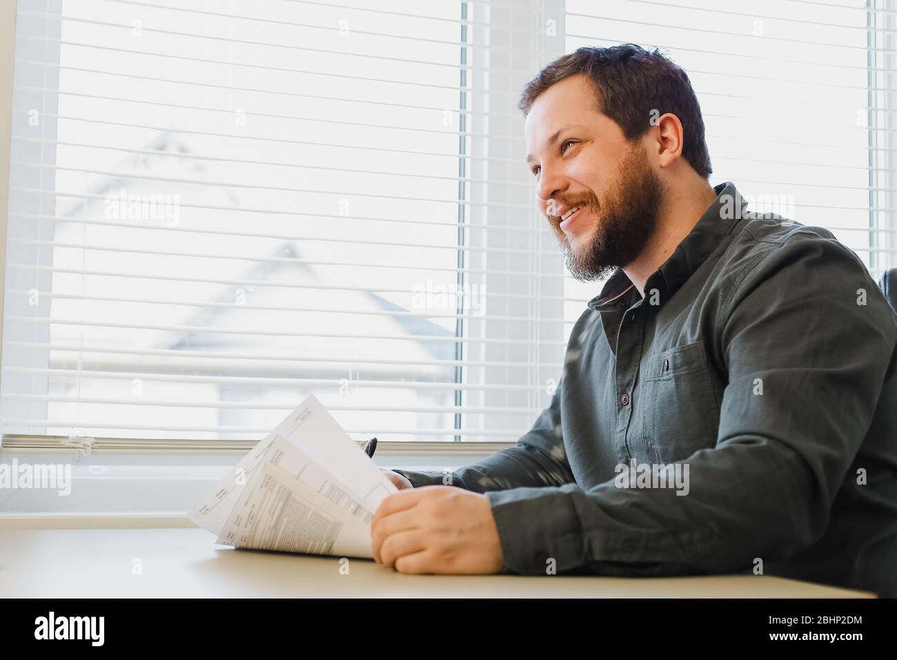 Manager holding business documents hi-res stock photography and images ...