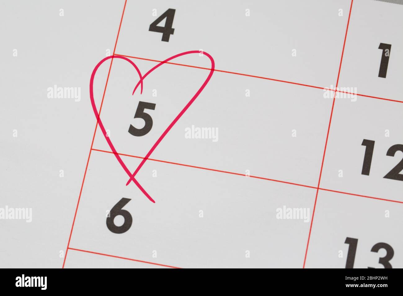 5th Date of the Month marked in red marker pen on a simple planner ...