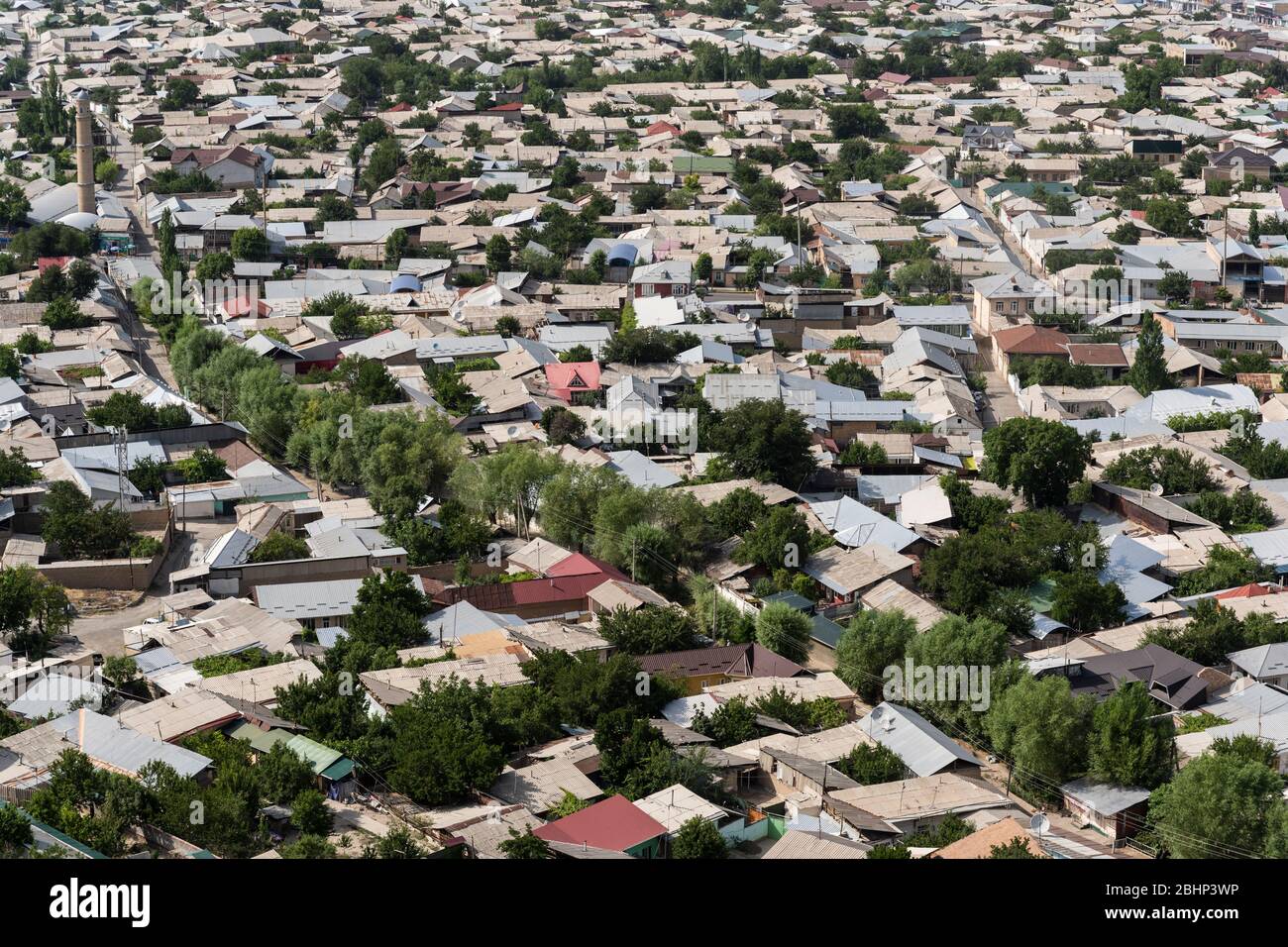 Osh, Kyrgyzstan - June 29, 2019: Rooftops of houses in Osh, the ...