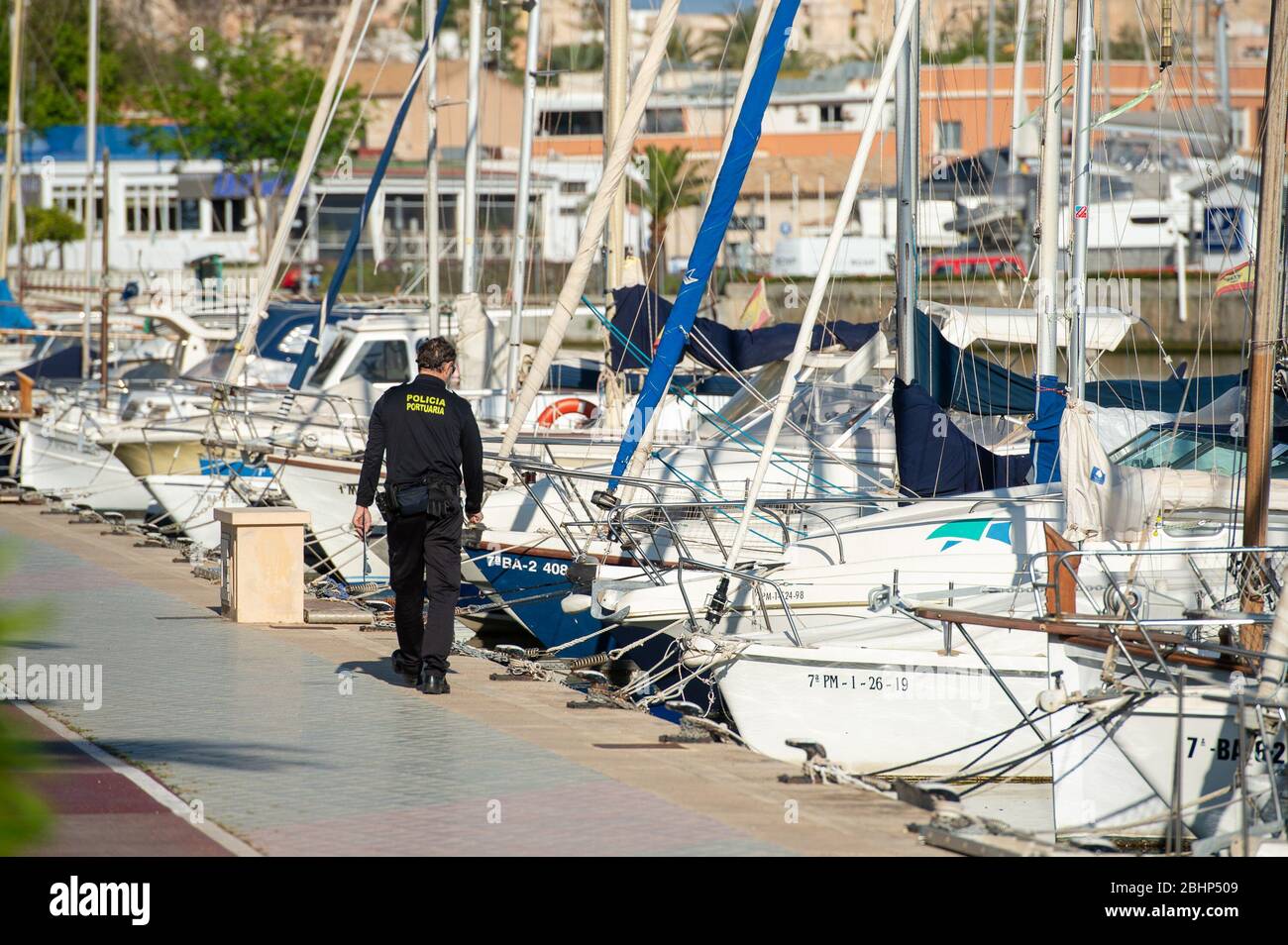 Port police offcier controls the moorings at palma port hi-res stock ...