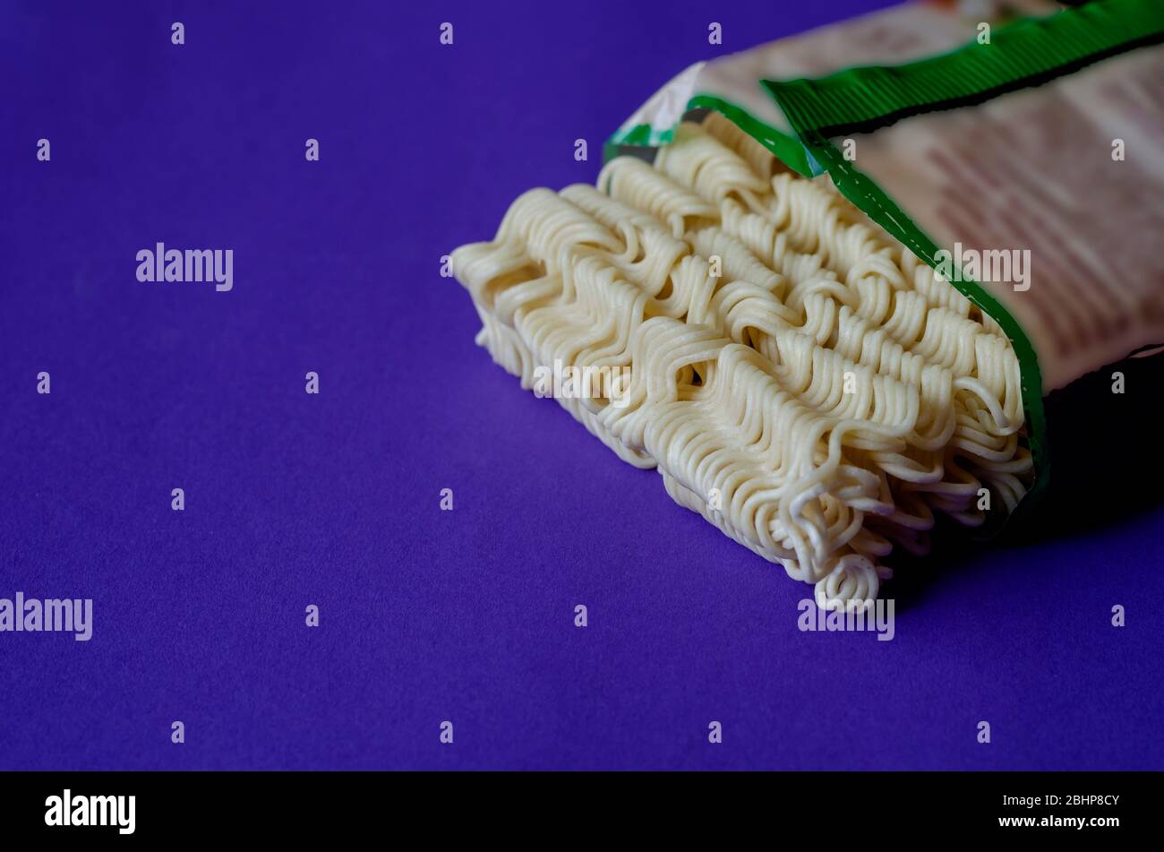 Uncooked instant noodles to open the wrapper.Rectangle of dry instant ...