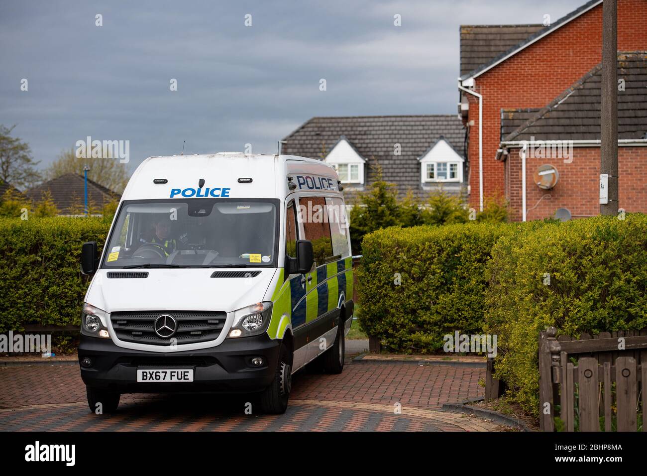 Police officer near the scene of the West Cross Shopping Centre ...