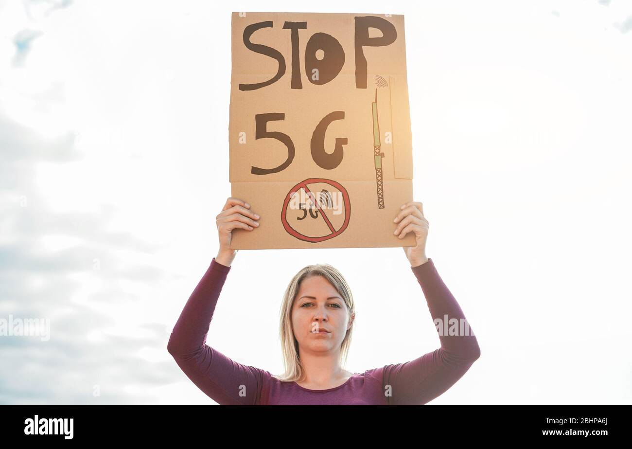 Young woman protest against 5g and cell towers - Electromagnetic ...
