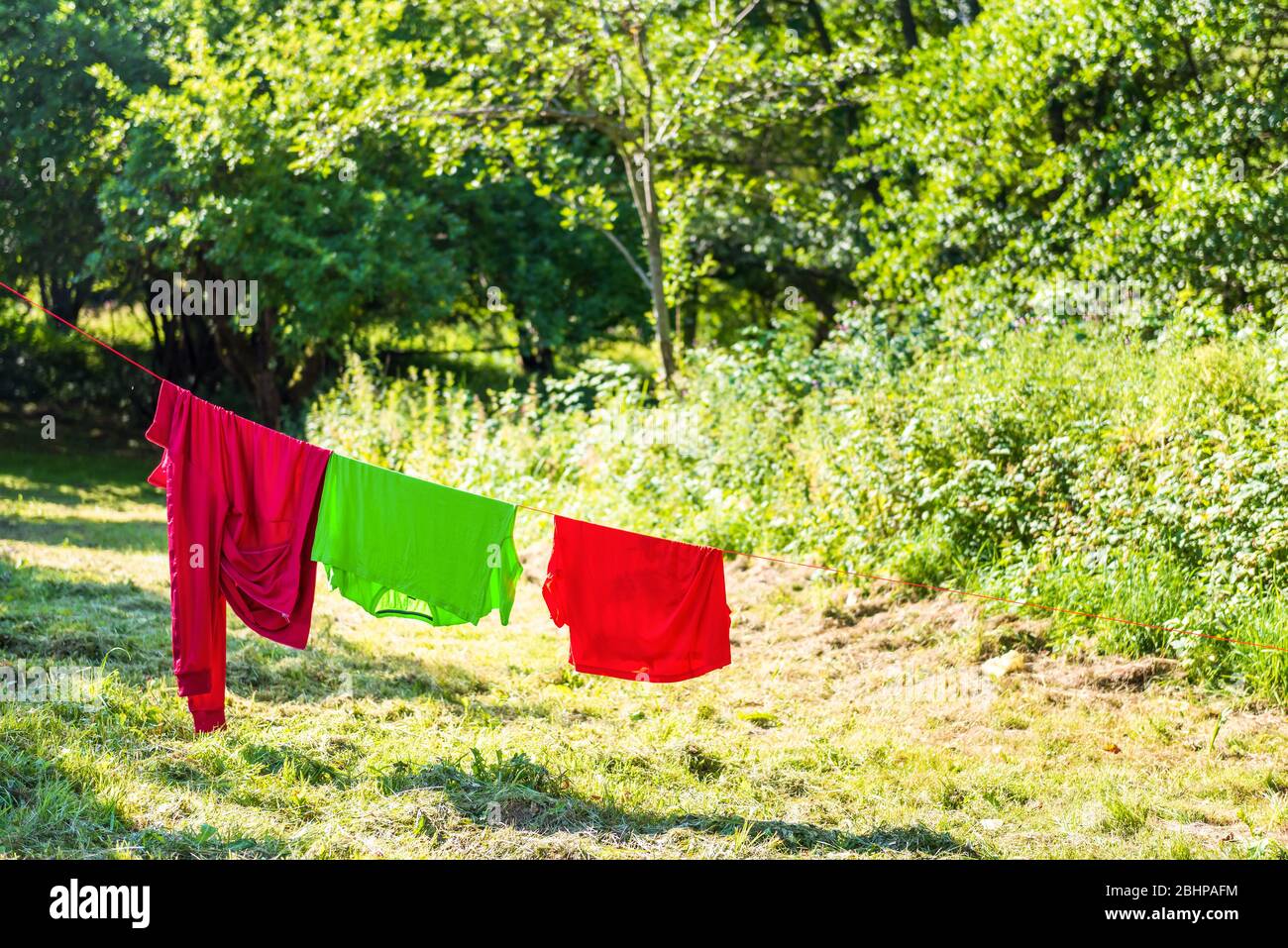drying wet clothes after kayaking in a tourist camp Stock Photo - Alamy