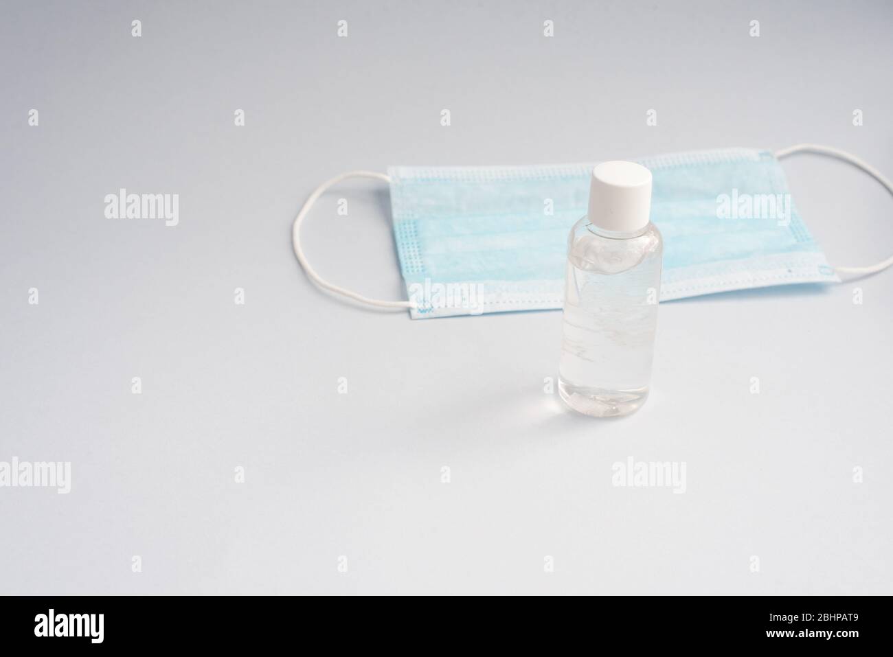 Antiseptic and protective mask for the respiratory tract on a blue ...