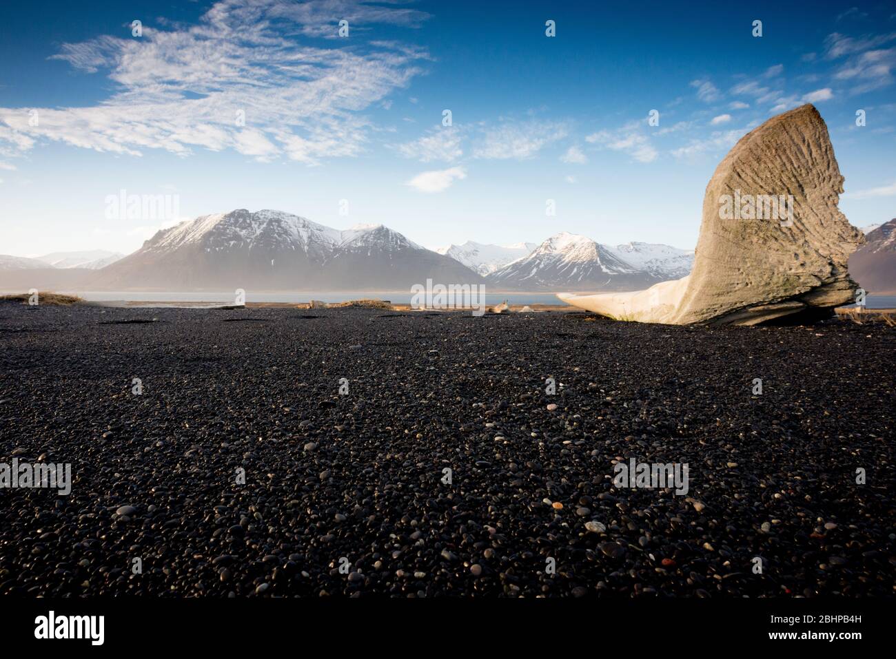 The black sand spit and mountainous backdrop at Eystrahorn, Iceland ...