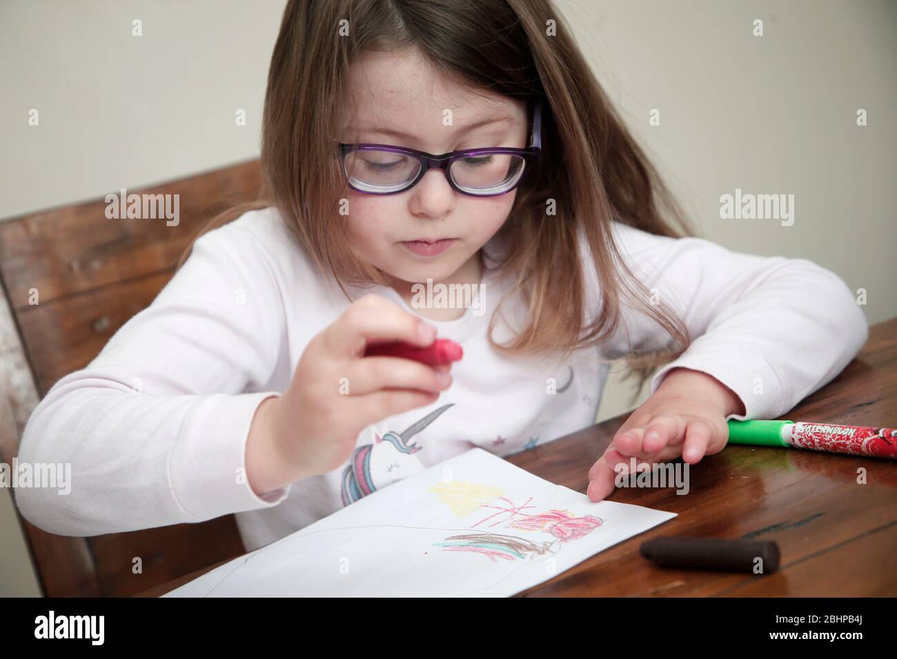 Four year old girl being home schooled Stock Photo - Alamy Four year old girl being home schooled Stock Photo - Alamy