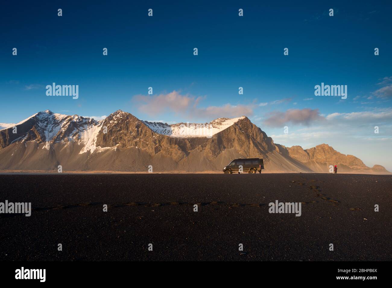 The black sand spit and mountainous backdrop at Eystrahorn, Iceland ...