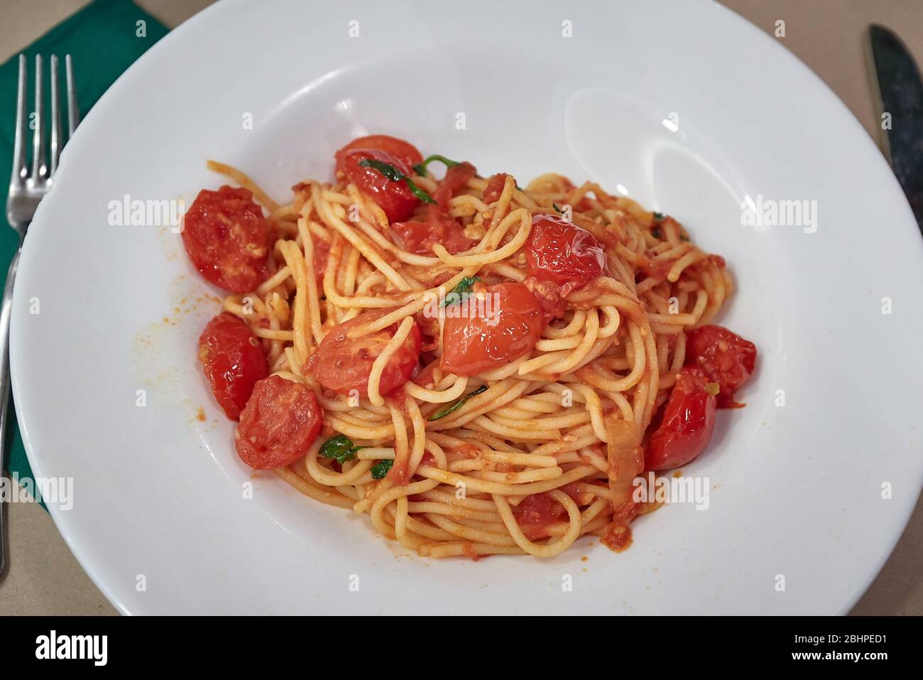 Spaghetti dish at a restaurant Stock Photo - Alamy