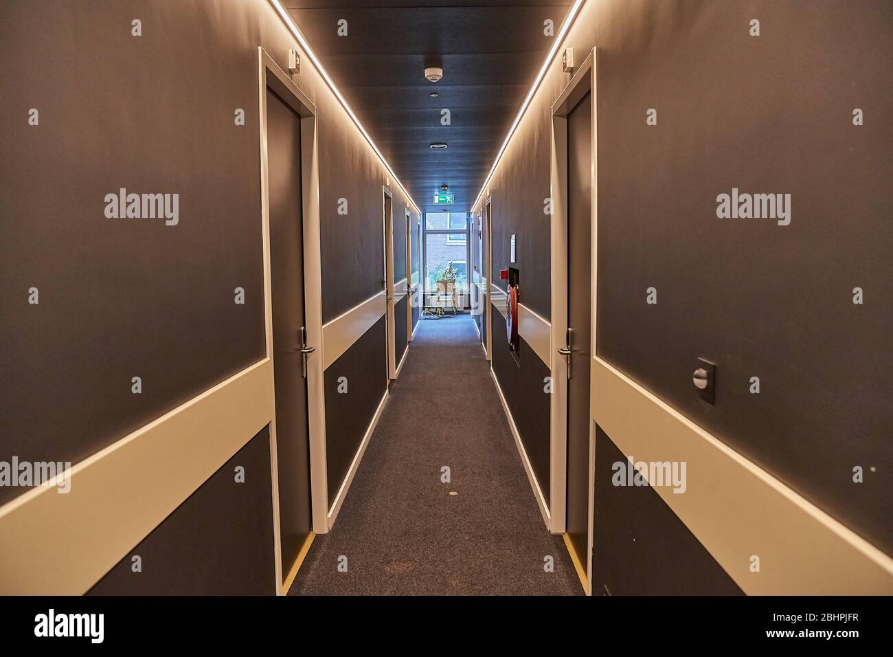 Corridor with dark walls Stock Photo - Alamy