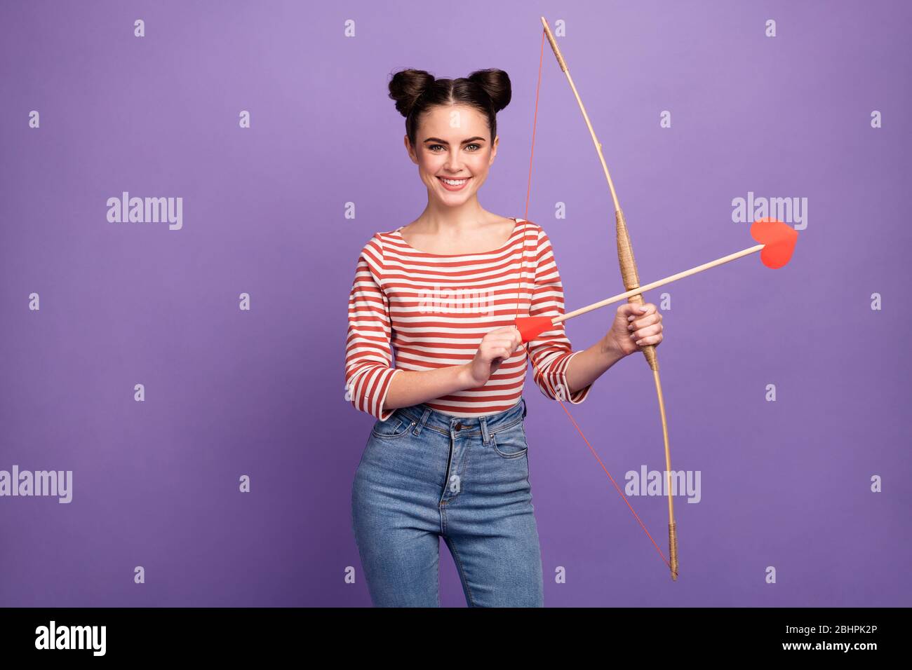 Photo of pretty teen lady hold cupid love arrows bow shoot aims hobby ...