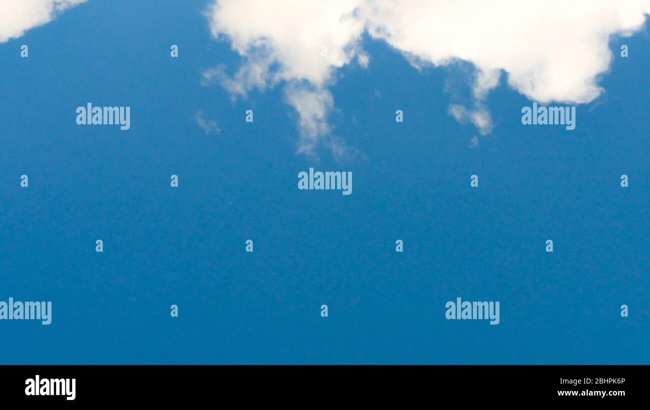 Blue sky background with white clouds. Nature Stock Photo - Alamy