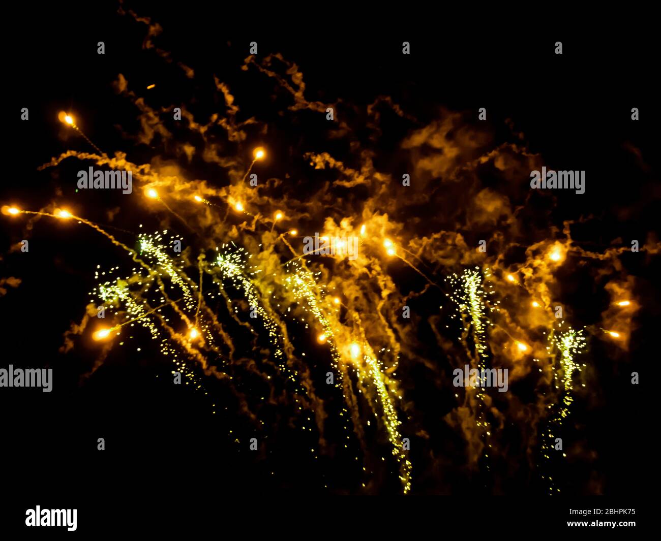 yellow fireworks on the black sky background. Celebration Stock Photo ...
