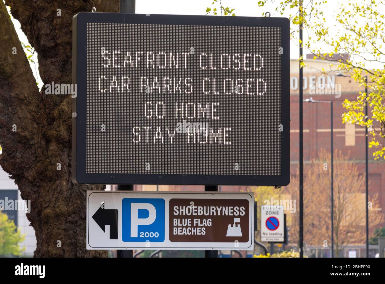 Seafront closed, car parks closed, go gome, stay home matrix sign ...