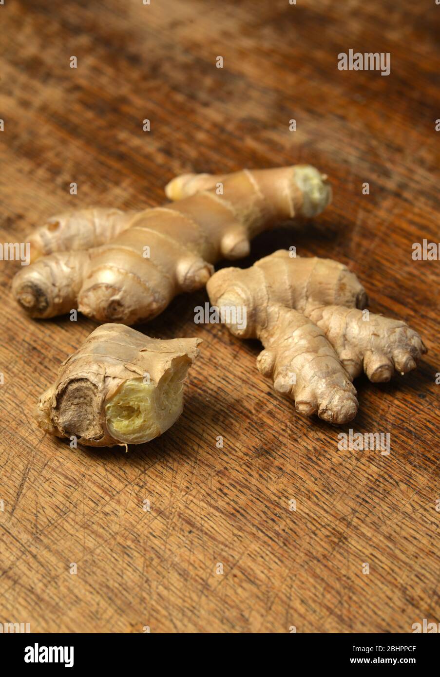 wooden table with ginger Stock Photo - Alamy