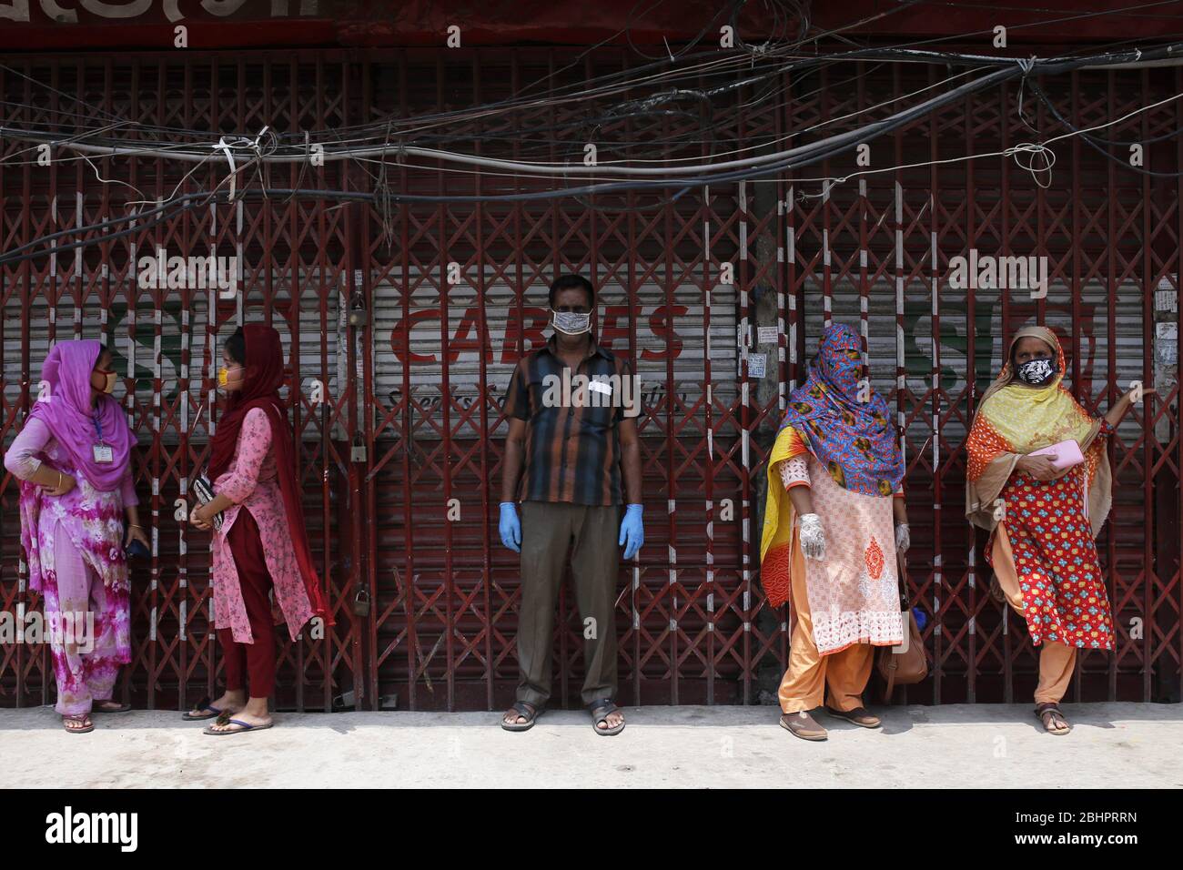 Dhaka, Bangladesh. 27th Apr, 2020. Garment workers gather to join their ...