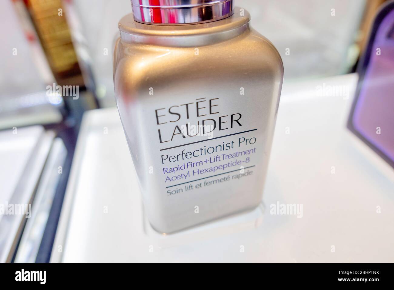 Estee Lauder Perfectinist Pro gray bottle sample on its shiny shelf in ...
