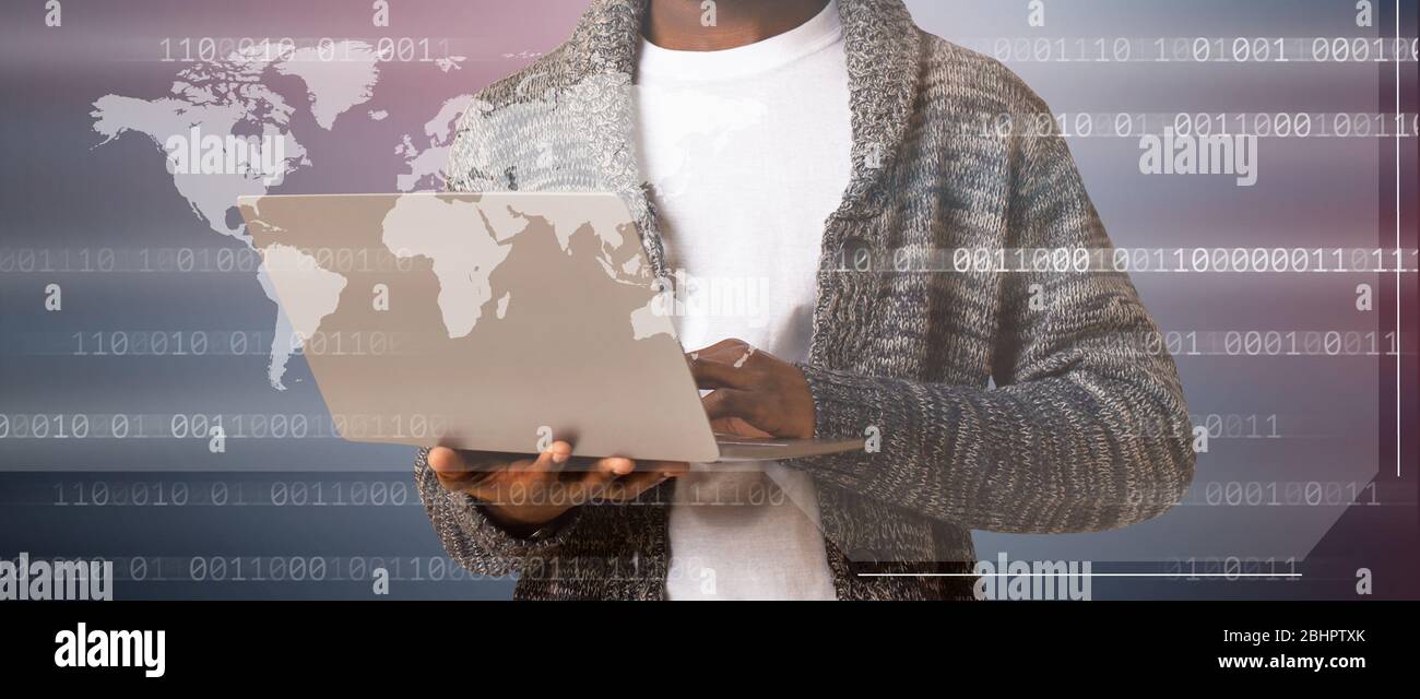 Hacker holding laptop with virtual display server data Stock Photo - Alamy