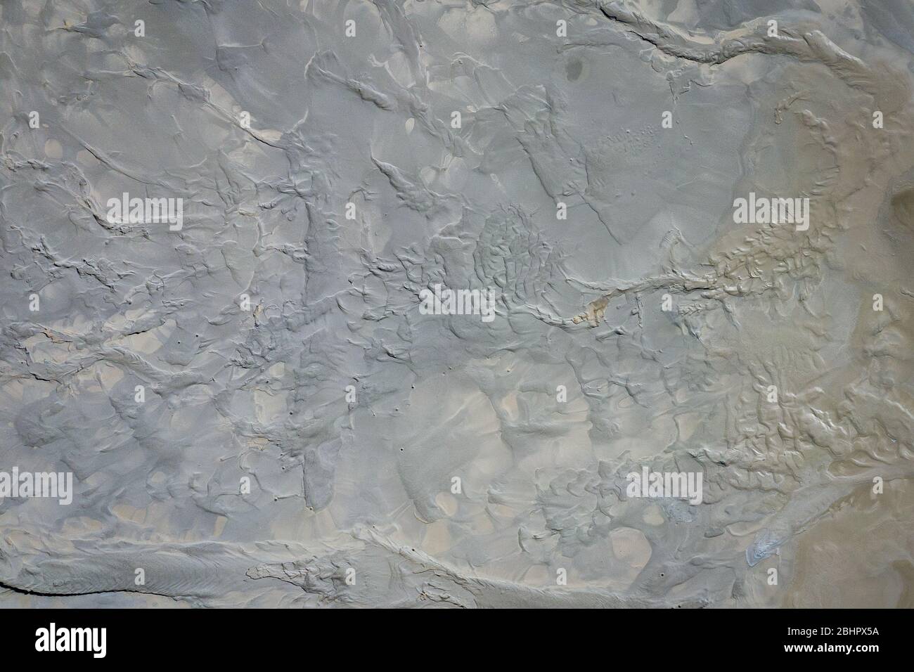 Aerial view of surrealistic industrial place. Dry surface. Desertic ...