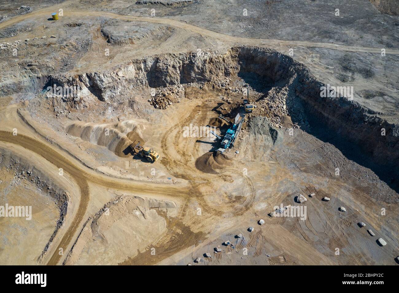 Aerial view of industrial mineral open pit mine. Opencast mining quarry ...