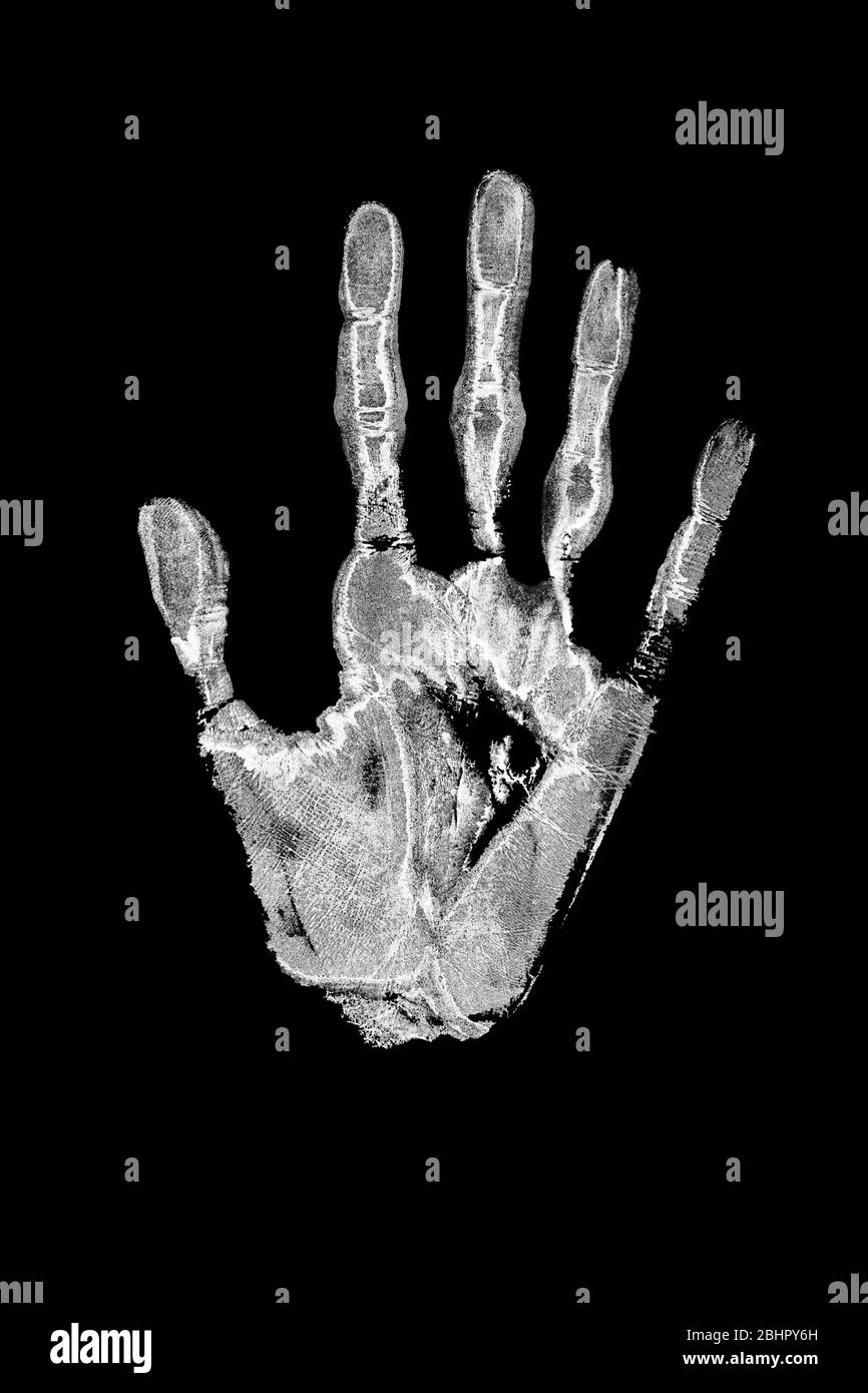 White watercolor print of human hand on black background isolated close ...