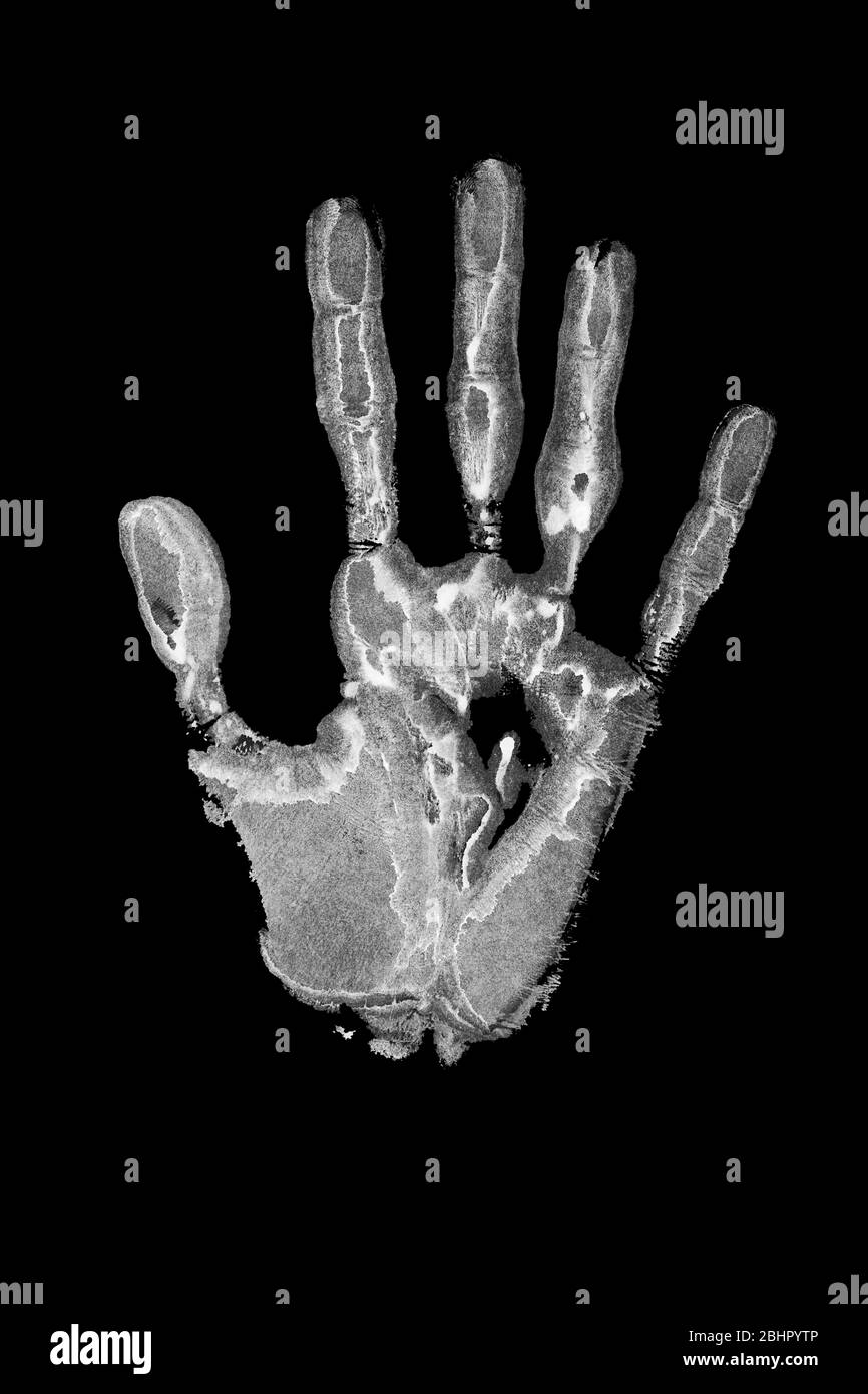White watercolor print of human hand on black background isolated close ...
