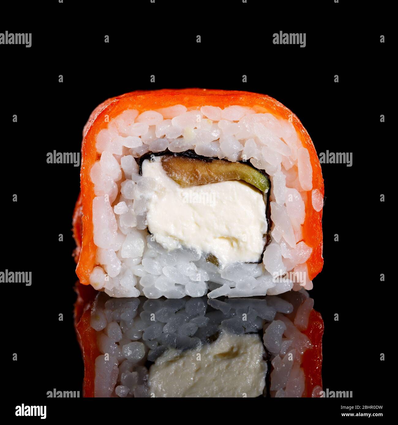 Sliced sushi Philadelphia on black background. Food and restaurants ...