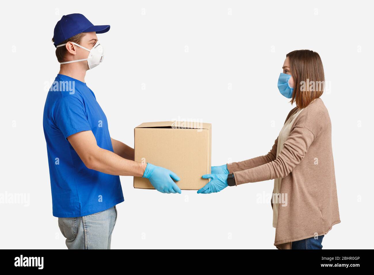 Transfer of box to client at quarantine Stock Photo - Alamy