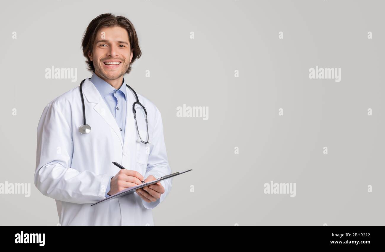 Health Insurance. Portrait Of Friendly Doctor With Medical Chart In ...