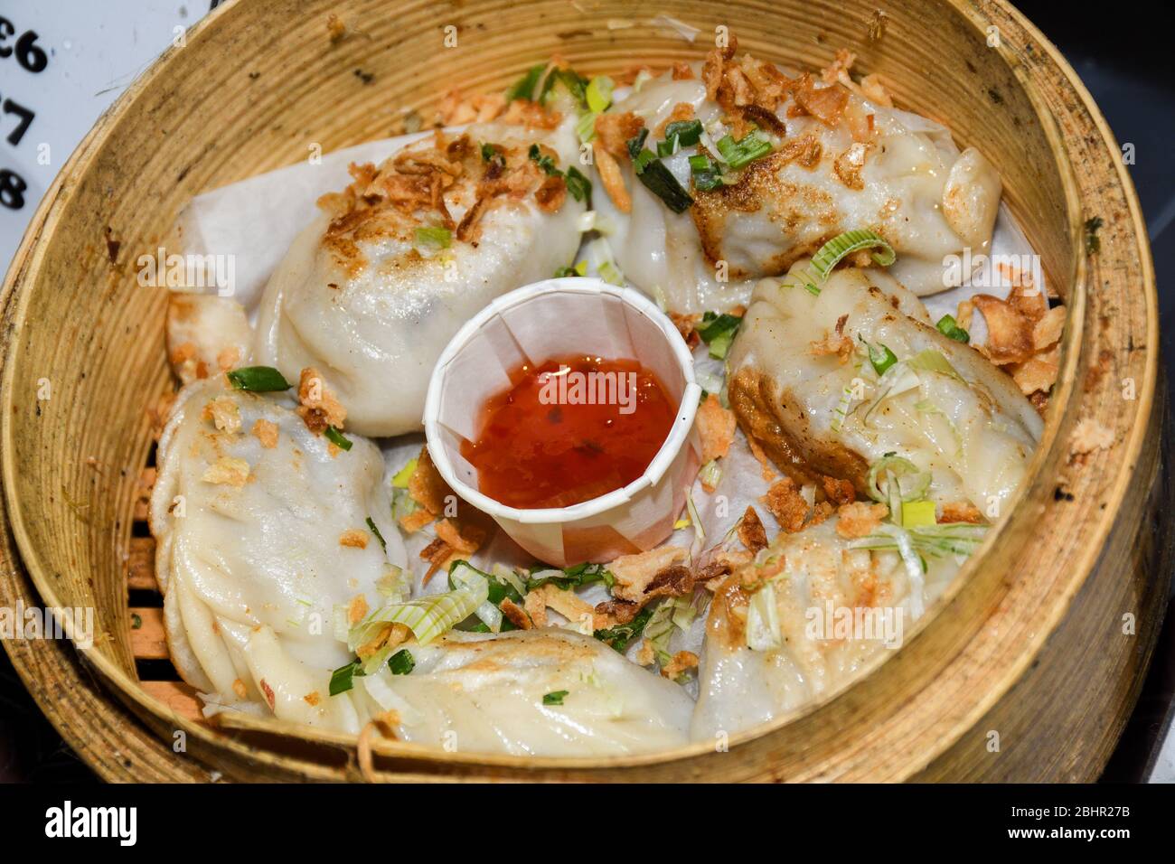 Plate of traditional nepali food momos. Steam cooked momos with sauce ...