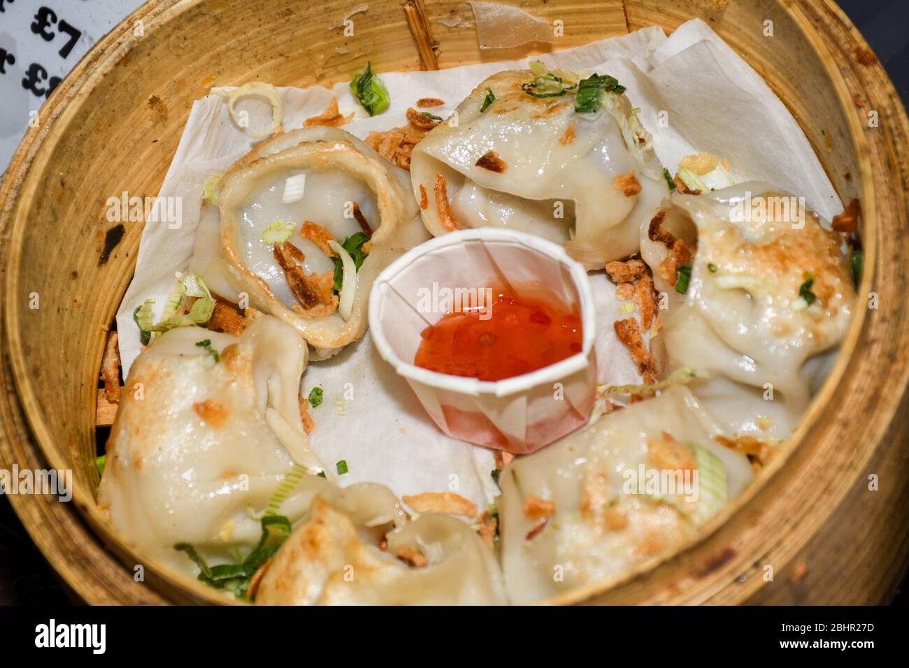 Plate of traditional nepali food momos. Steam cooked momos with sauce ...