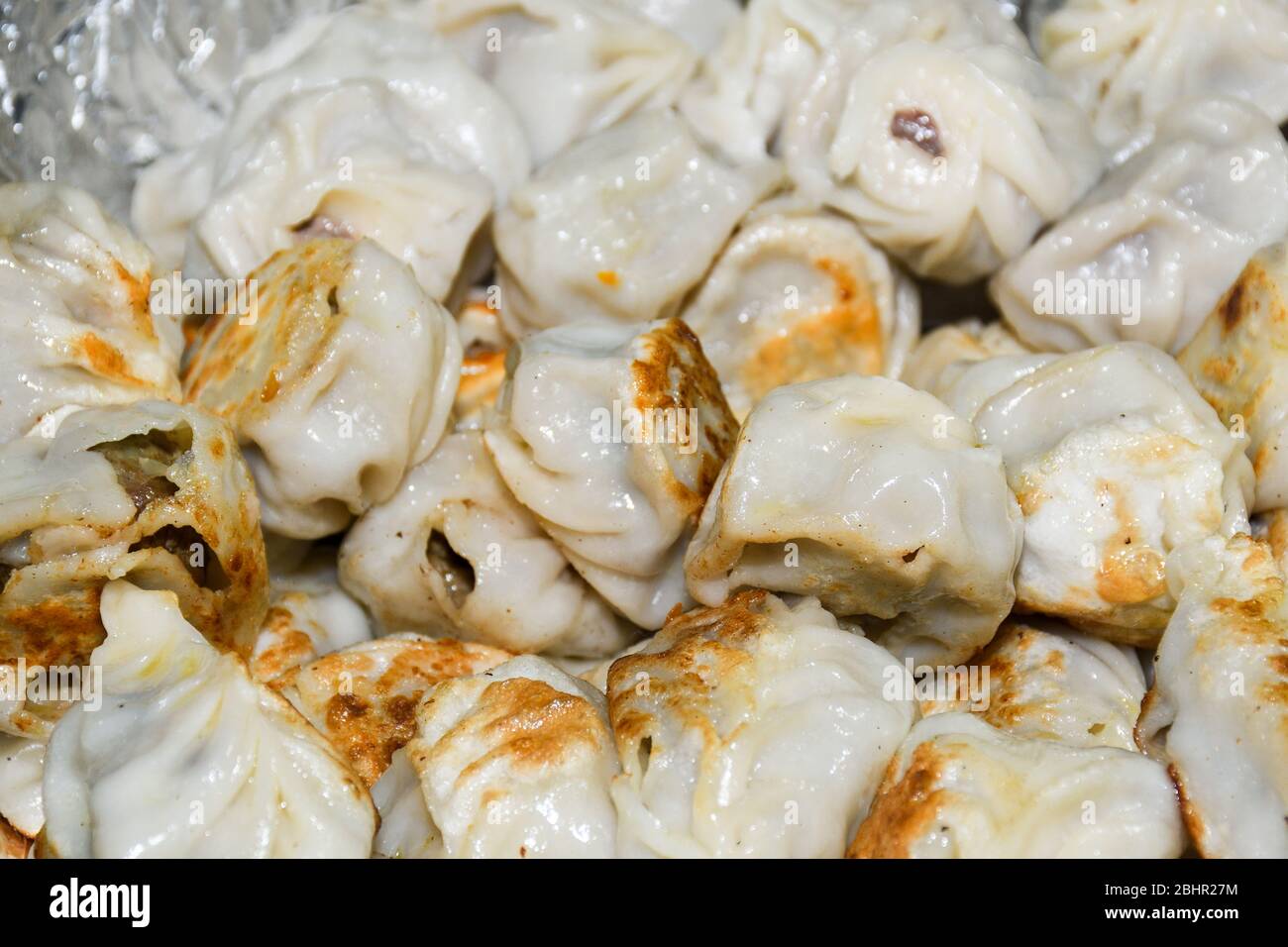 Plate of traditional nepali food momos. Steam cooked momos with sauce ...