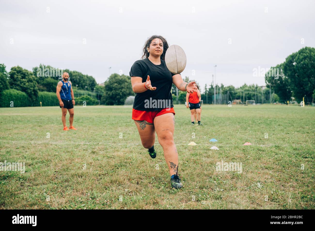 Female rugby training with men hi-res stock photography and images - Alamy