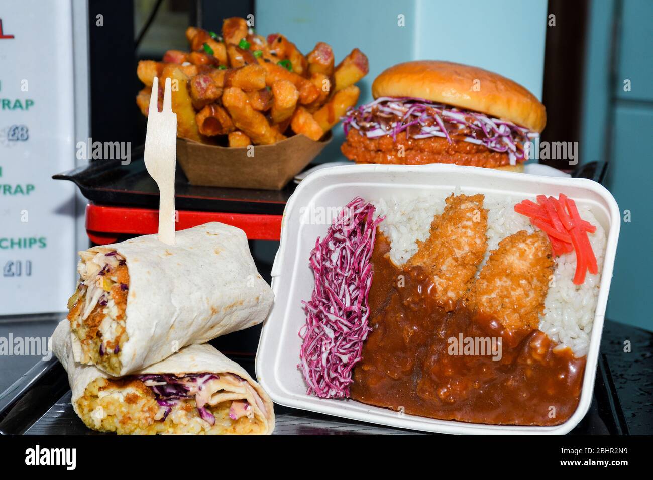 Street food displayed during food festival. Mexican, Indian, Asian ...