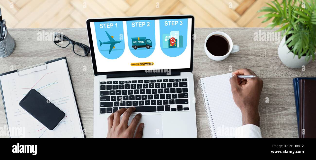 African american businessman making order from abroad Stock Photo - Alamy